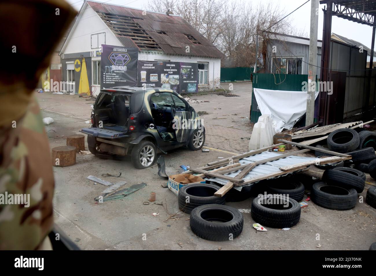 BUCHA, UKRAINE - APRIL 5, 2022 - A destroyed car stays in Vokzalna ...