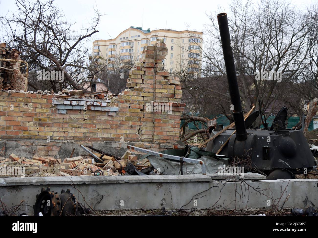 BUCHA, UKRAINE - APRIL 5, 2022 - A destroyed military vehicle is ...