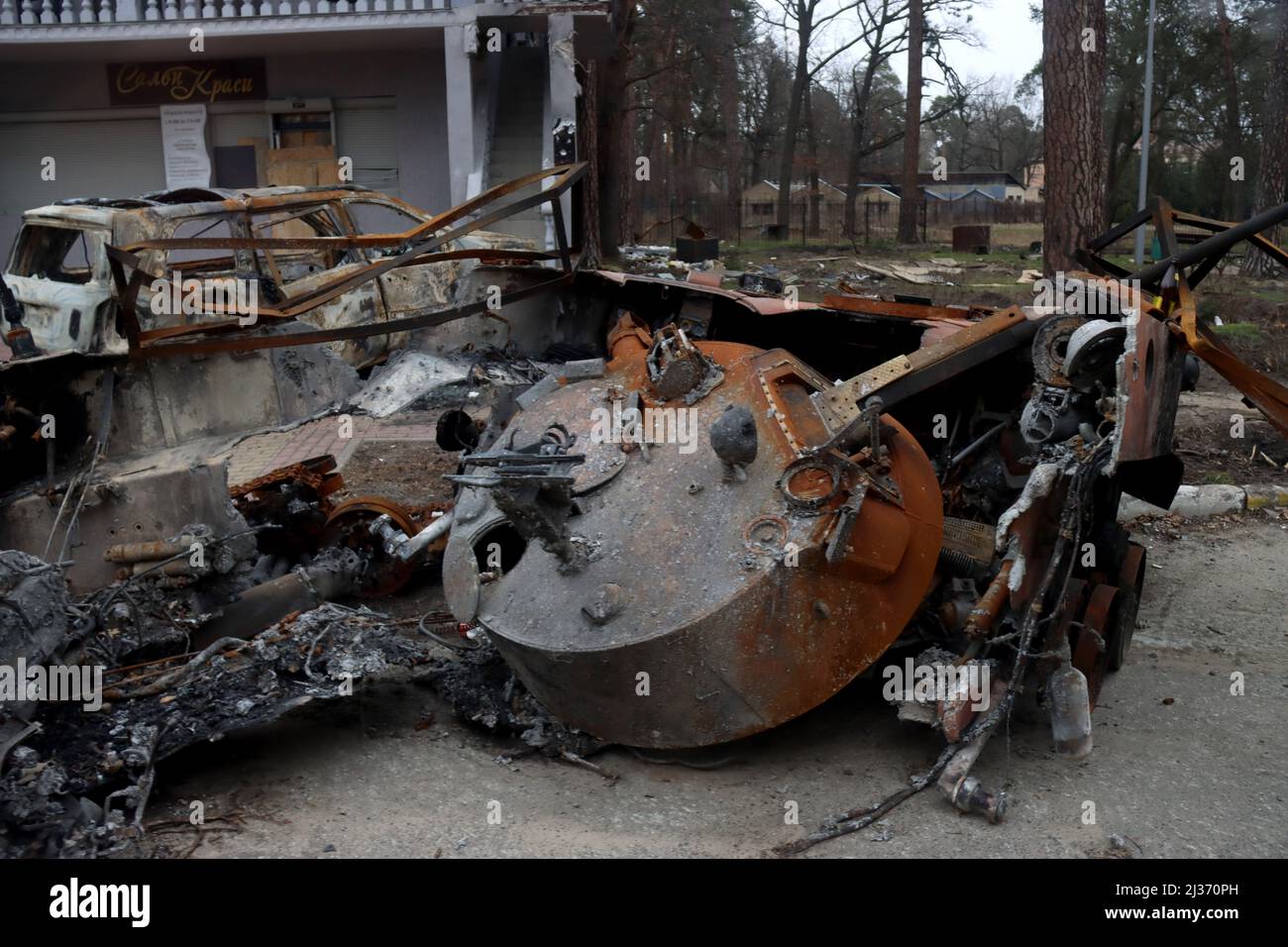 BUCHA, UKRAINE - APRIL 5, 2022 - A destroyed military vehicle is ...