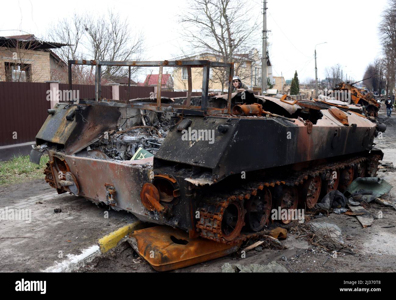 BUCHA, UKRAINE - APRIL 5, 2022 - A destroyed military vehicle is ...