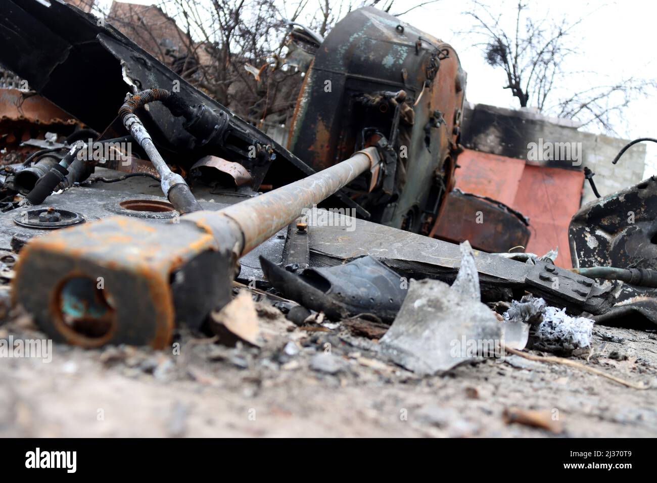 BUCHA, UKRAINE - APRIL 5, 2022 - A destroyed military vehicle is ...