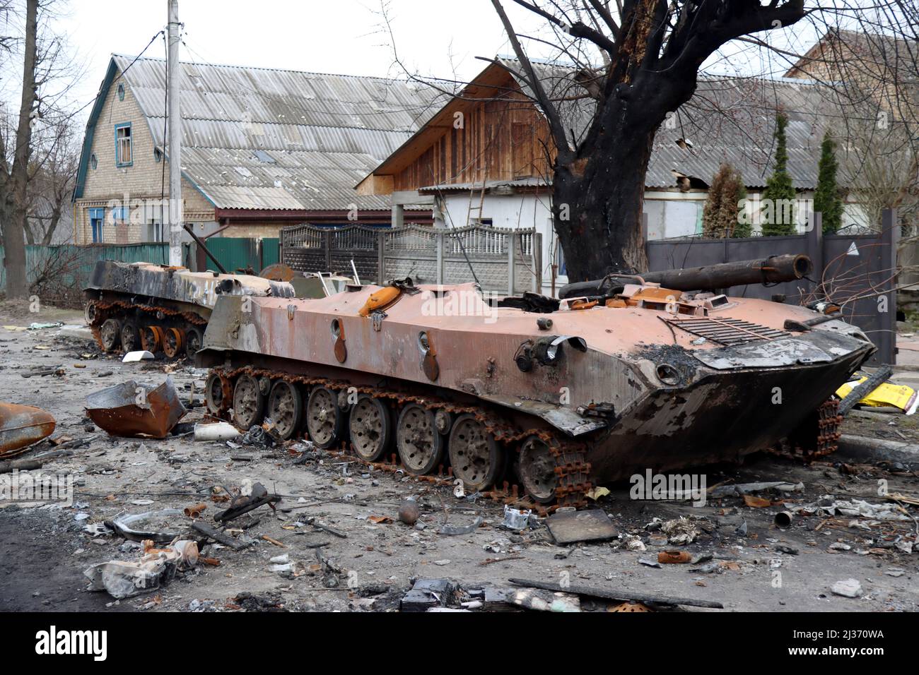 BUCHA, UKRAINE - APRIL 5, 2022 - A destroyed military vehicle is ...