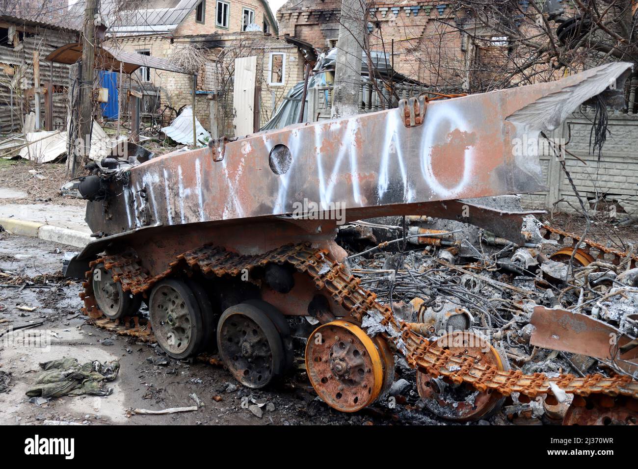 BUCHA, UKRAINE - APRIL 5, 2022 - A destroyed military vehicle is ...