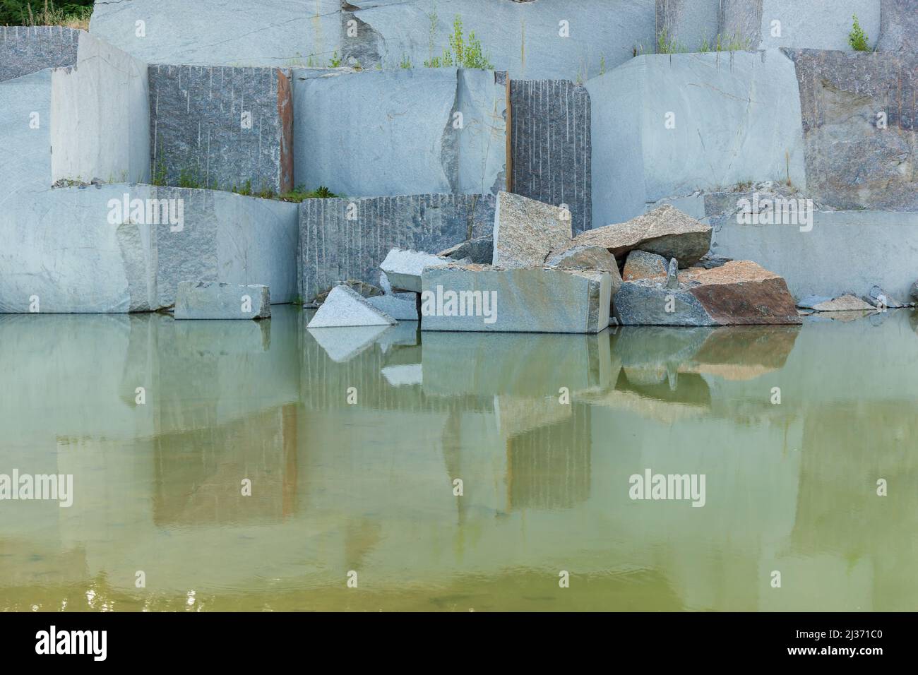 Granite quarry with large granite blocks Abandoned granite quarry with ...