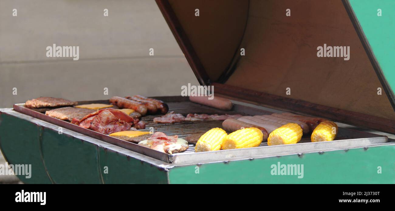 A Mix of Popular Foods Being Cooked on a Barbeque Stock Photo - Alamy