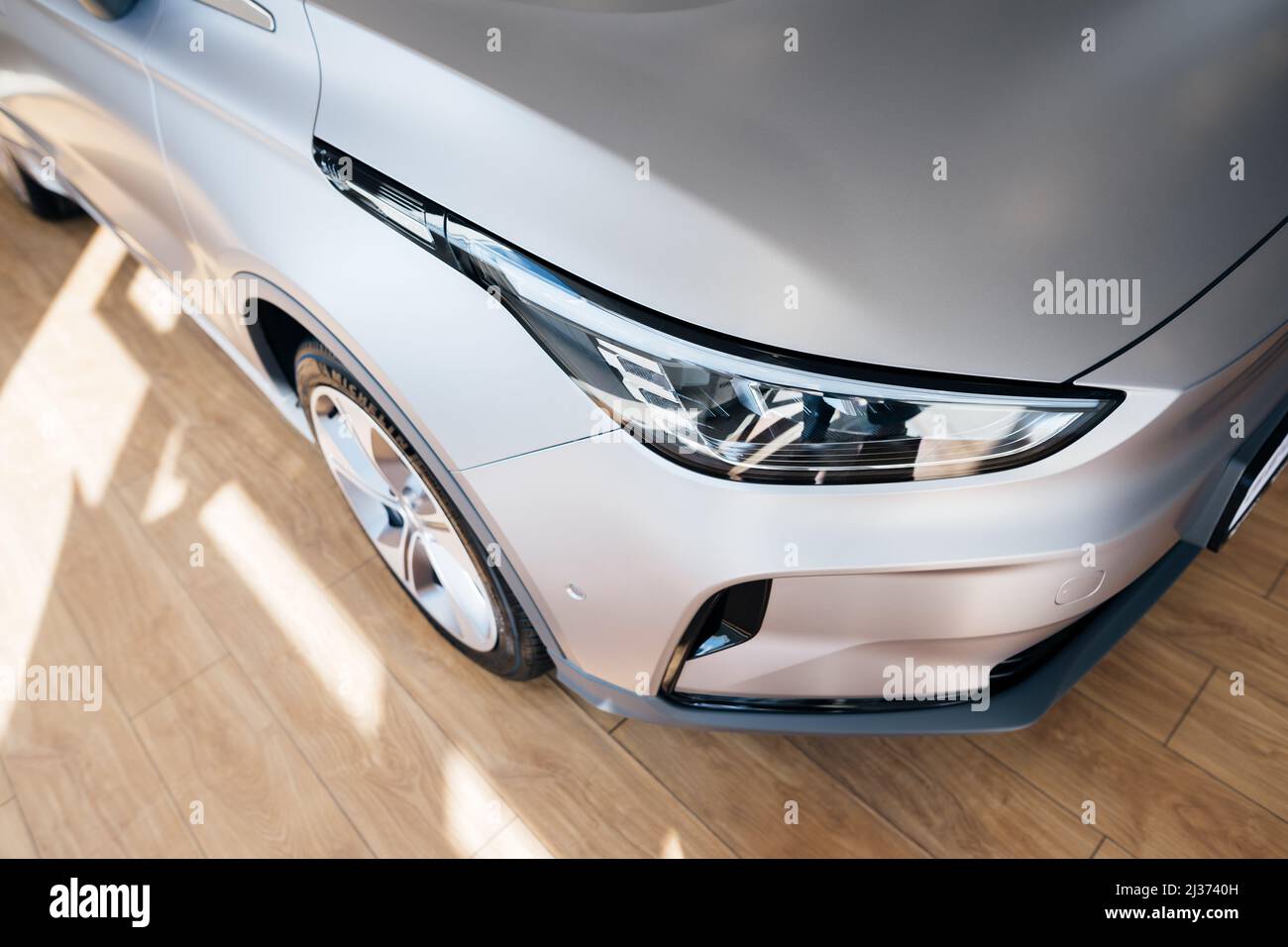 Car headlight of grey automobile closeup Stock Photo - Alamy