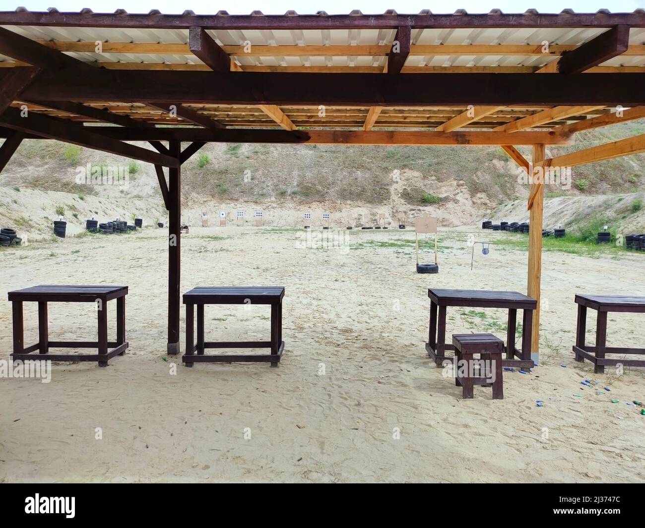 Outdoor unconventional gun shooting of target range. High quality photo ...