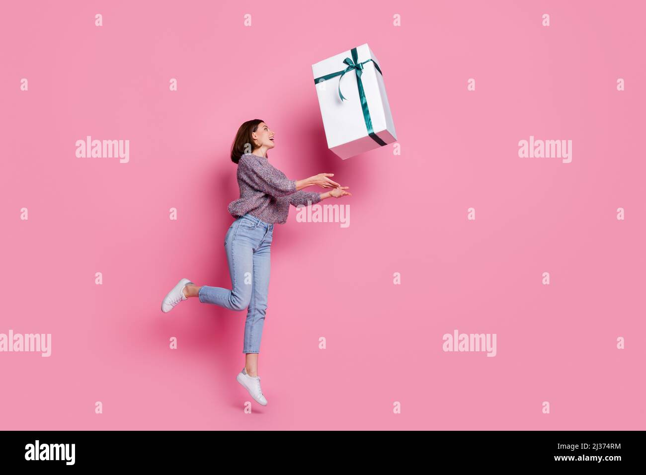 Full length body size view of nice cheerful girl jumping throwing big ...