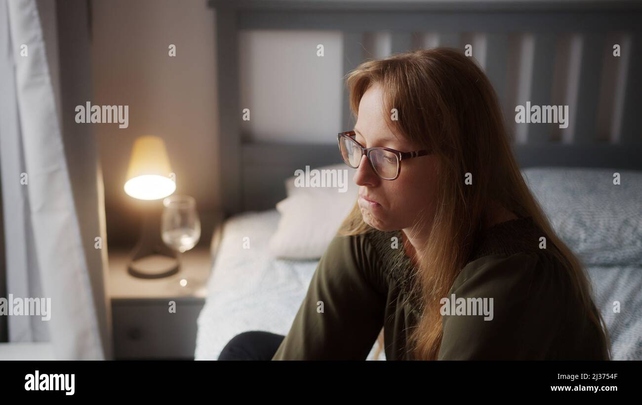 Red haired woman lying in bed hi-res stock photography and images - Alamy