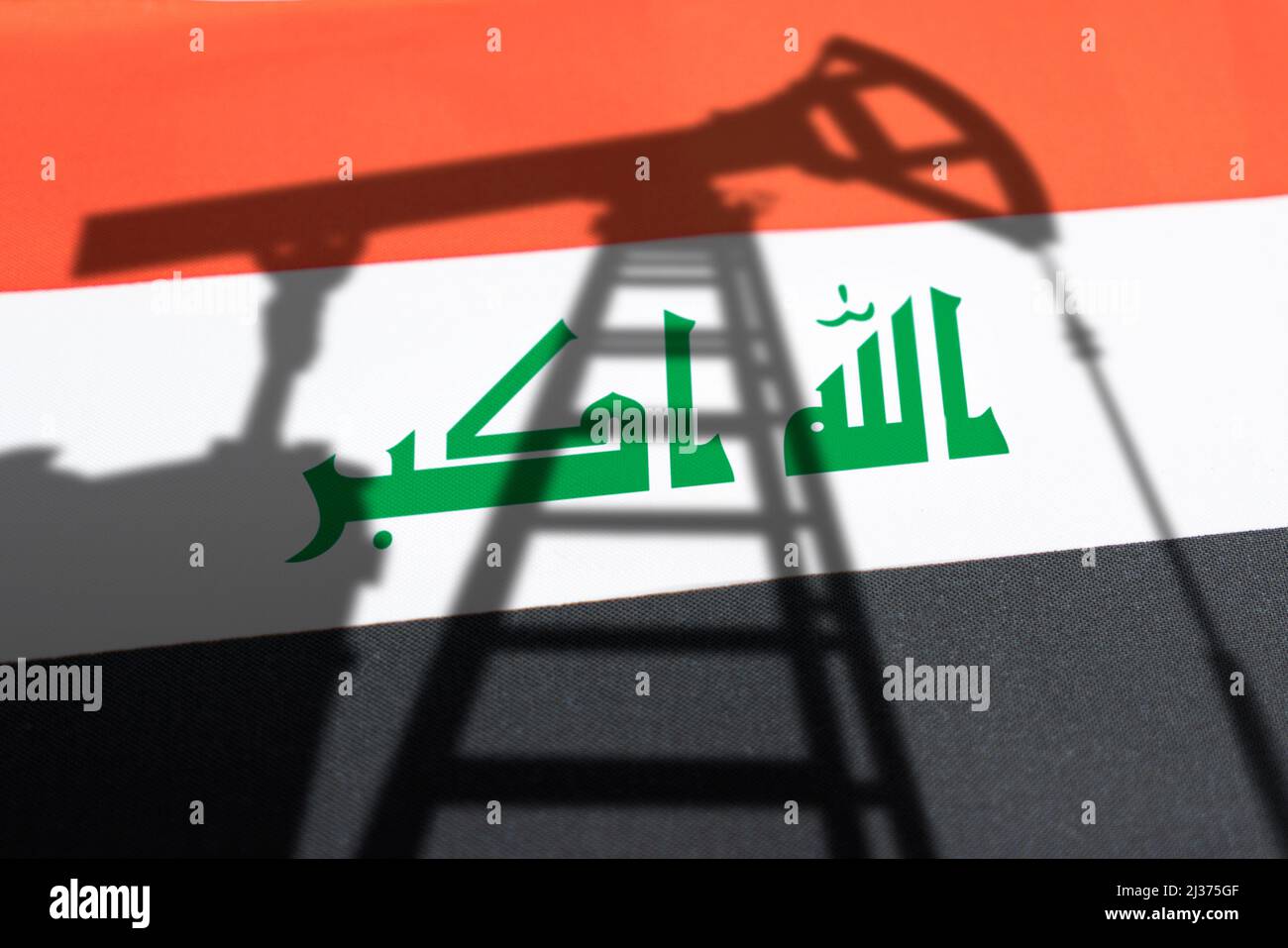The oil industry of iraq. Oil rigs on the background of the iraqi flag ...