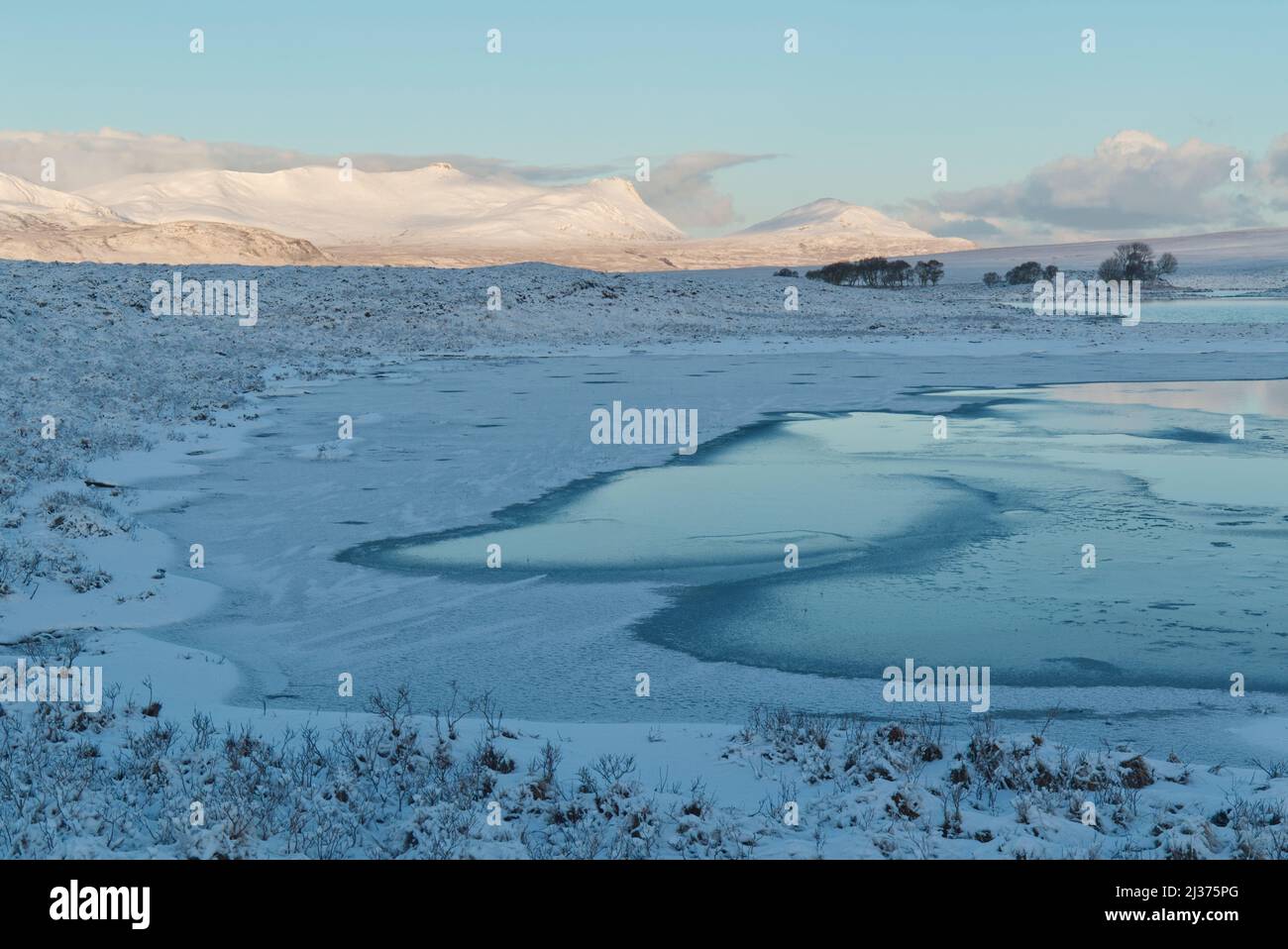 Frozen Loch Syre with Ben Loyal beyond, Highland Scotland Stock Photo ...
