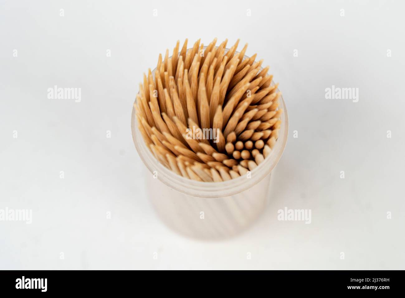 Box of toothpicks, toothpicks in a small cylindrical box isolated on ...