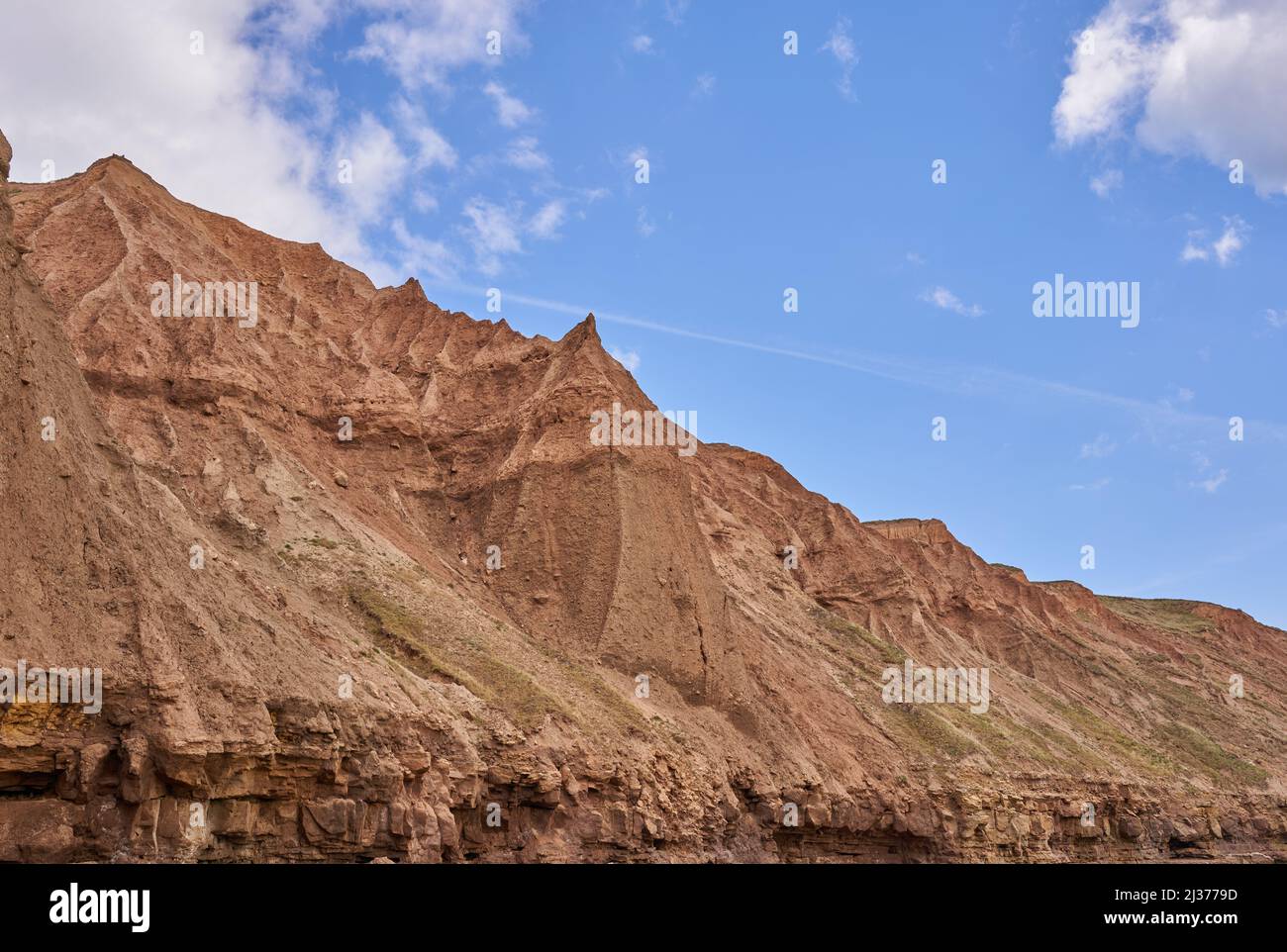 Soil cliff face with water erosion patterns Stock Photo - Alamy
