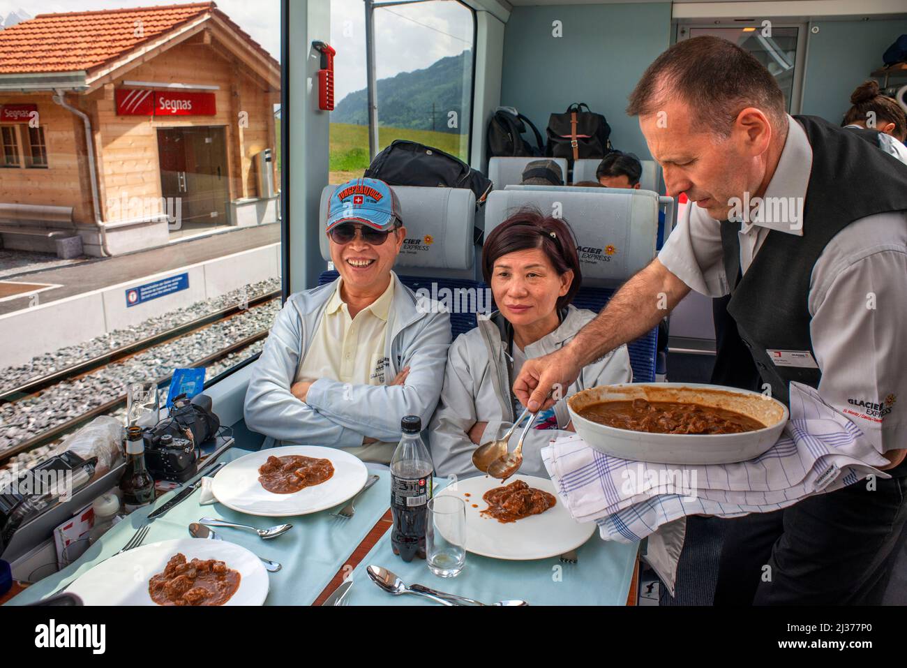 Typical swiss food inside first class of the glacier express train from ...