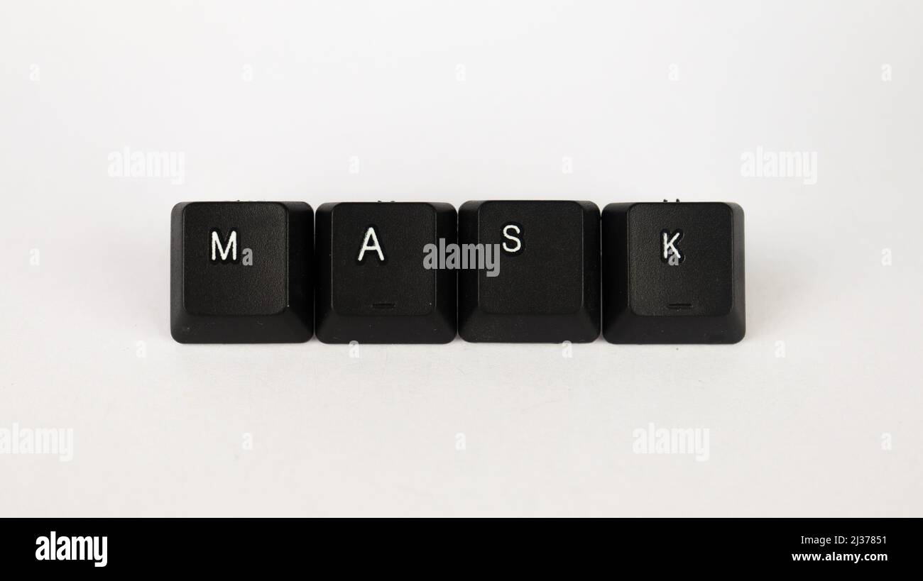 Mask text created with keyboard keys isolated on white background ...