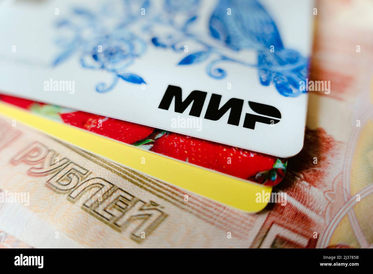 April 2, 2022. Barnaul. Russia: Mir payment card on background of paper ...