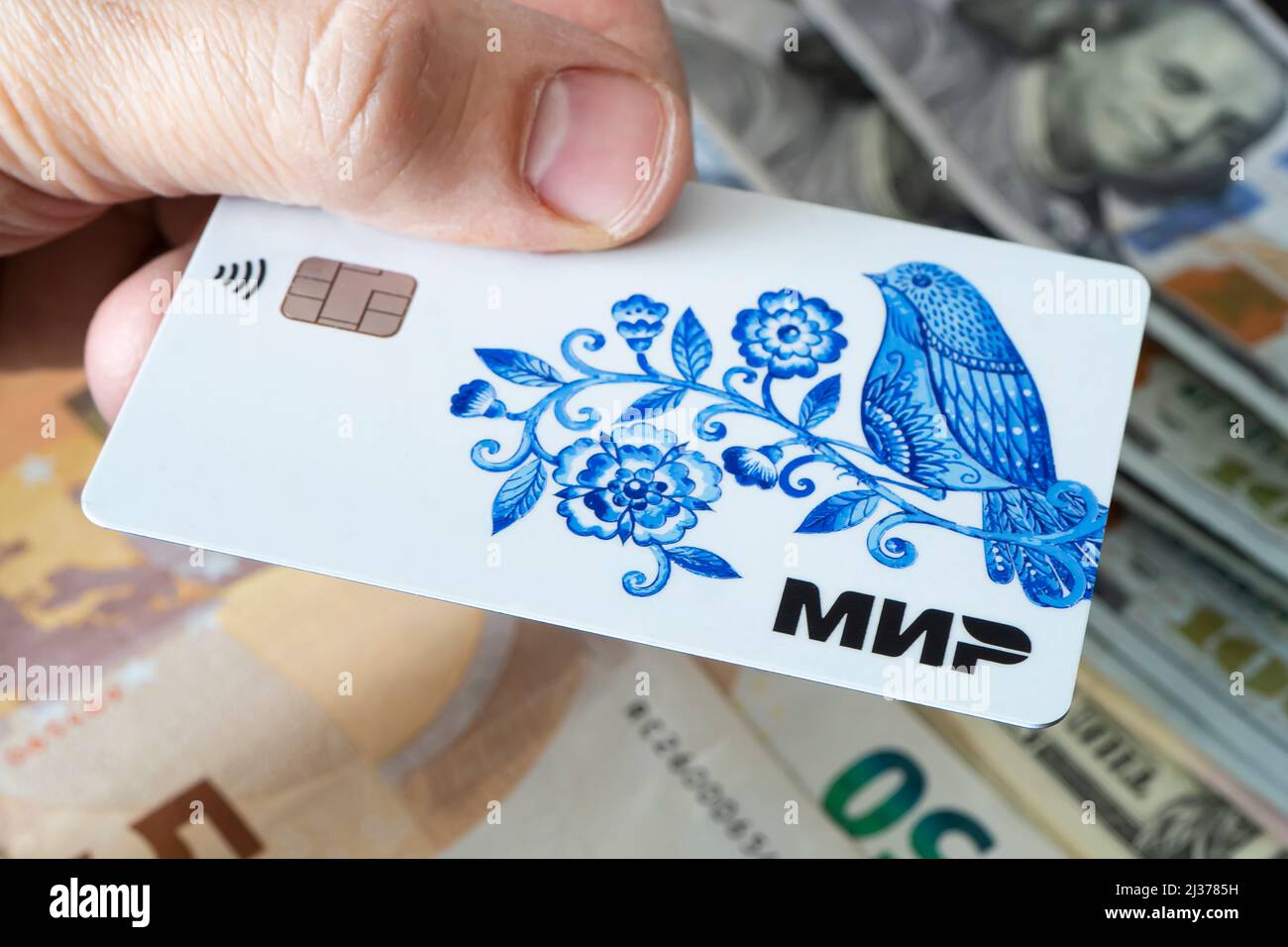April 2, 2022. Barnaul. Russia: Mir payment card on background of paper ...