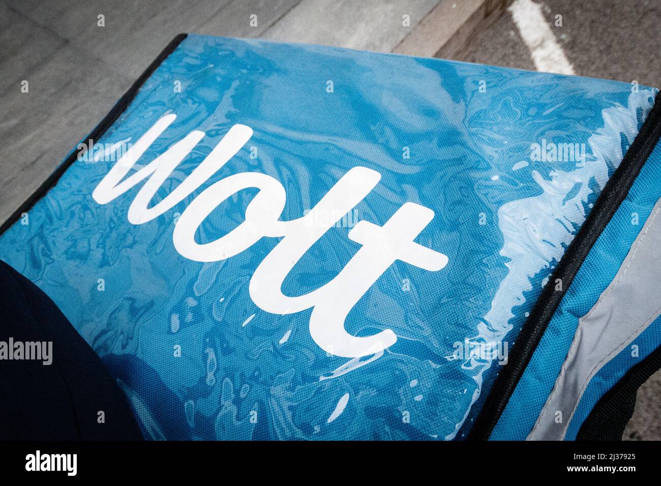 Close-up on the WOLT logo on a blue box - an international food ...
