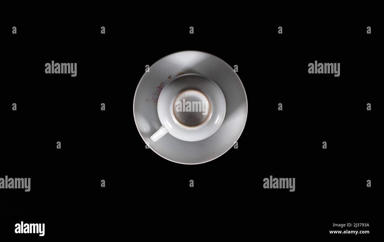 Upside down white coffee mug, fortune telling by coffee cup, isolated ...