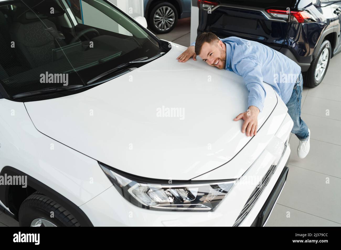 Man hug car hi-res stock photography and images - Alamy