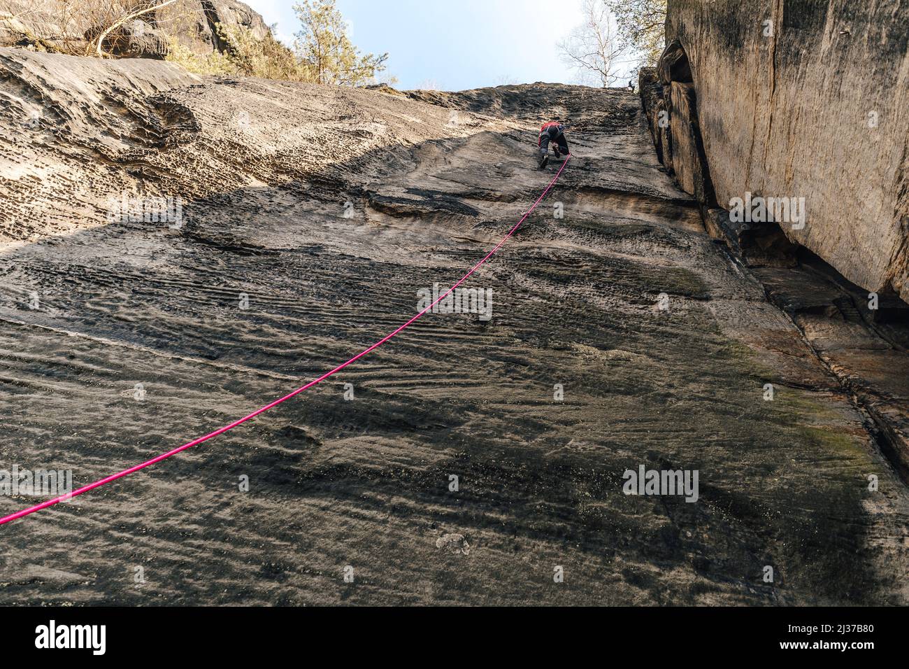 Epic sport climbing on giant sandstone cliffs of Elbe sandstone towers ...