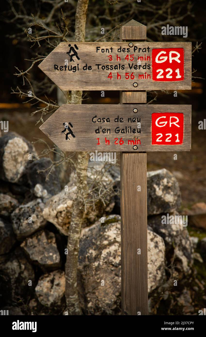 A vertical shot of a sign for the GR221 long-distance hiking trail in ...