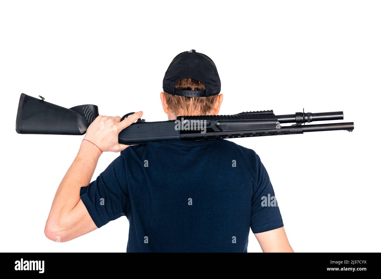 Hunter holding a rifle over his shoulder isolated on white background ...