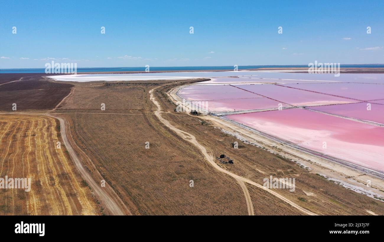 Aerial view of White salt on the shores of the island in Pink Island ...