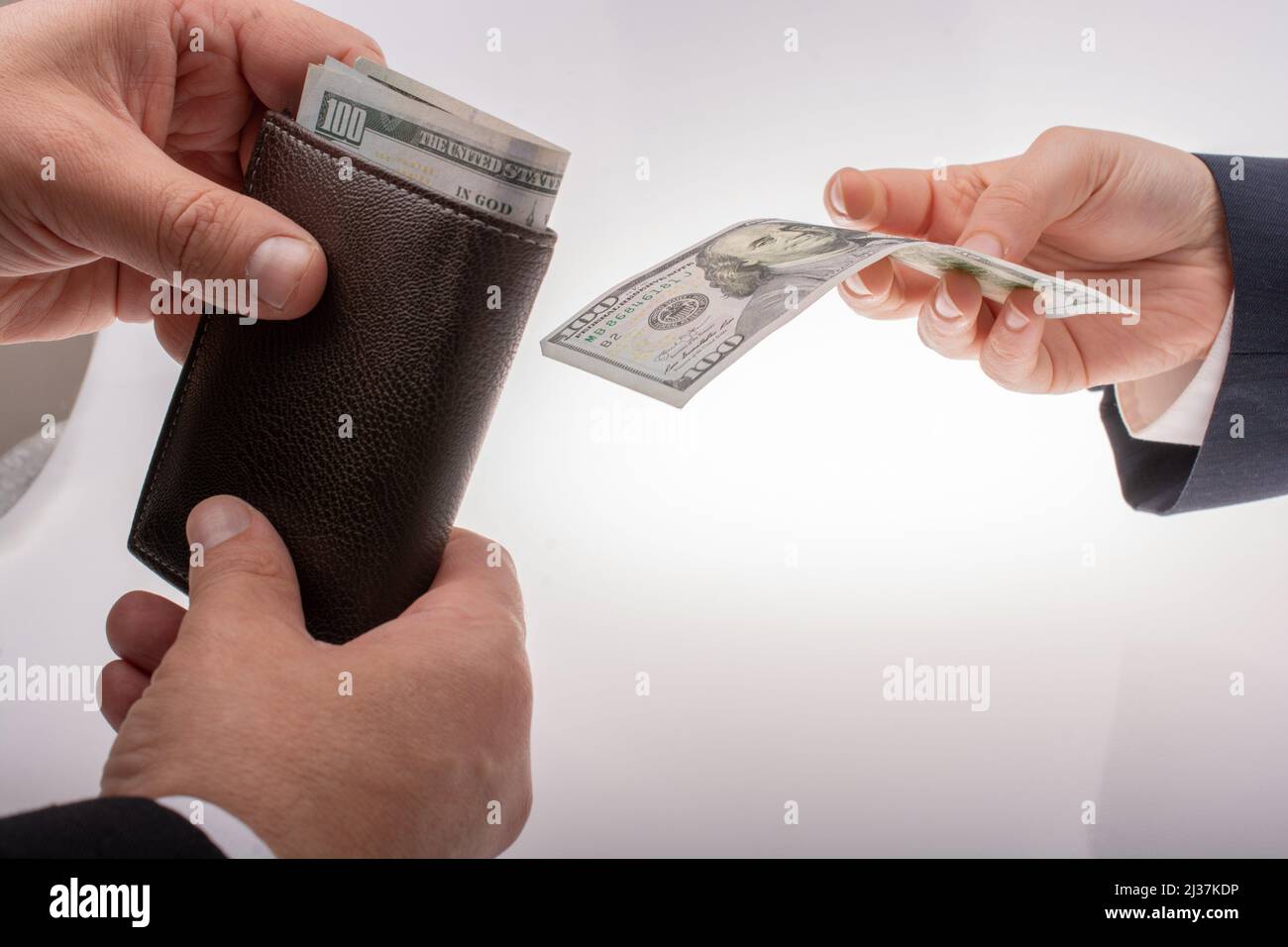 Old people giving money hi-res stock photography and images - Alamy