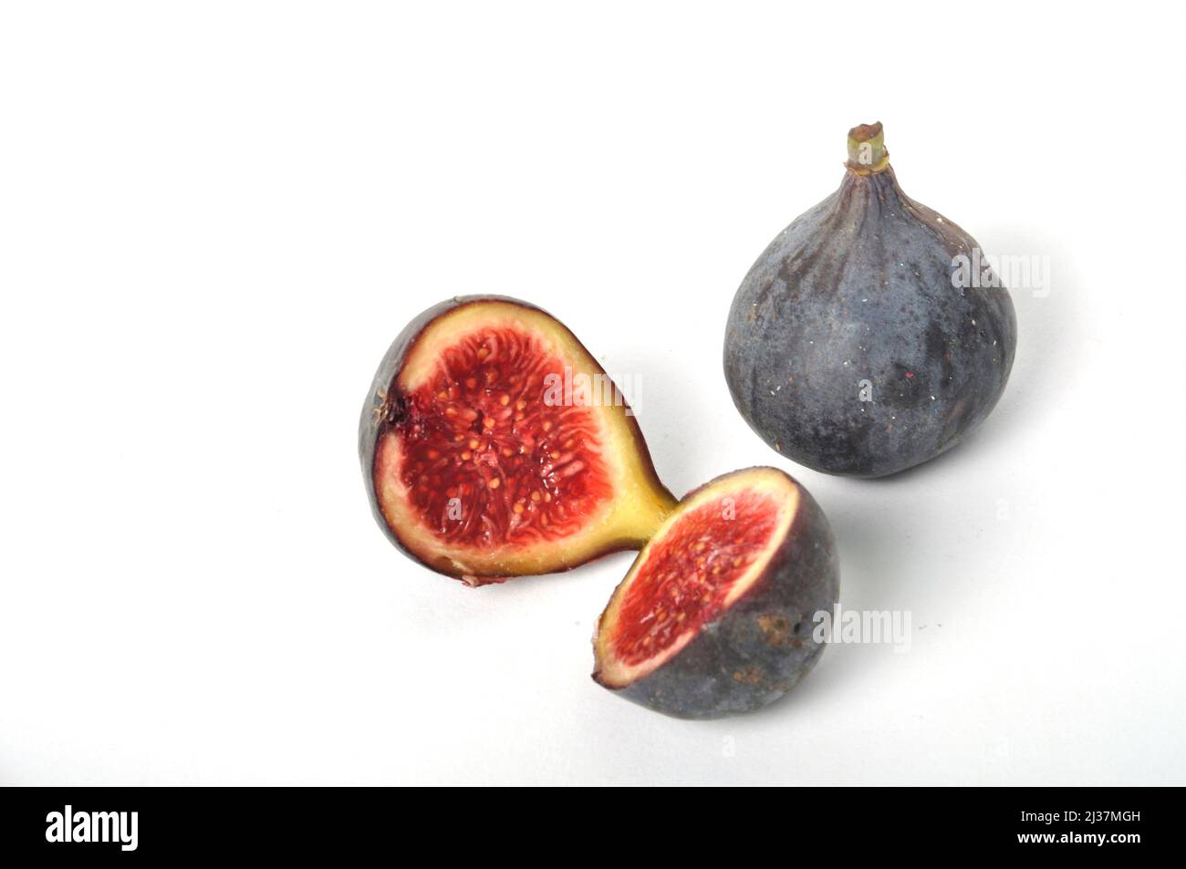 Spanish figs on a white background Stock Photo - Alamy