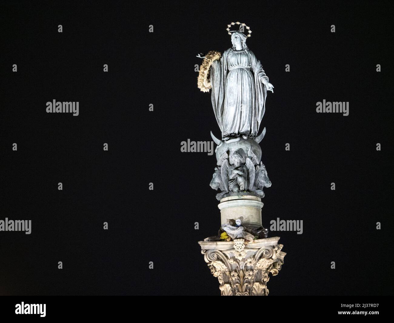 detail Immaculate Conception column scuplture statue in rome at night ...