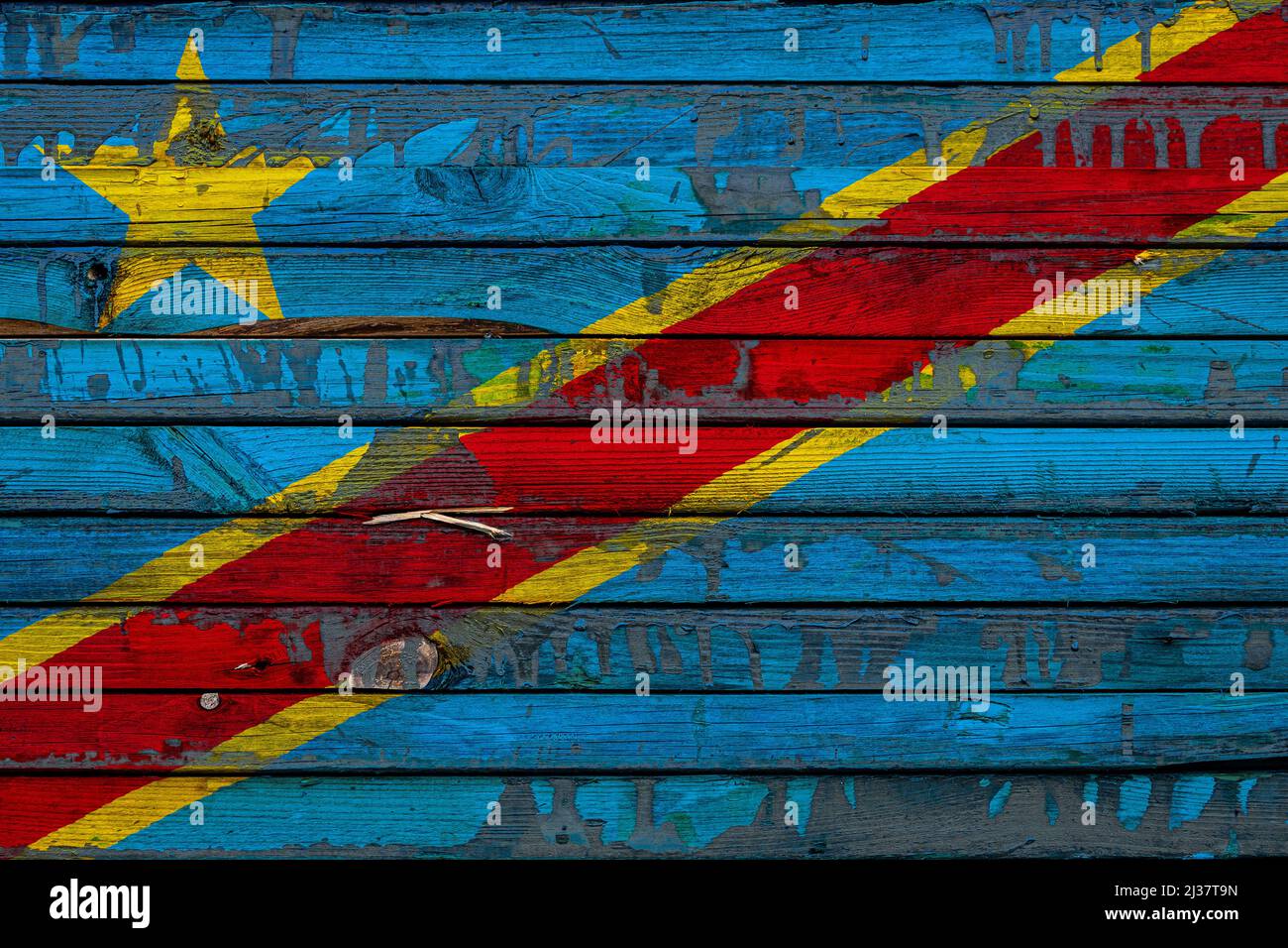 The national flag of Democratic Republic of the Congo is painted on ...