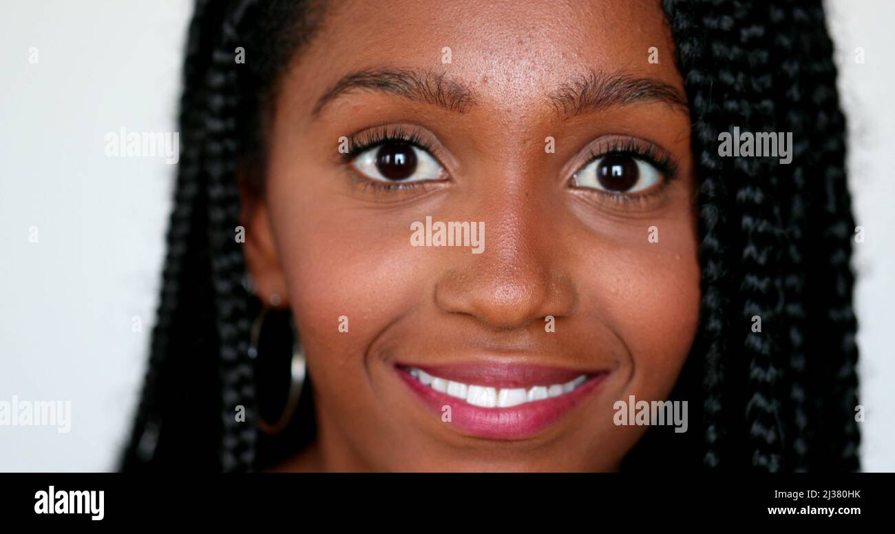 African girl surprise reaction, black teen young woman close-up face ...