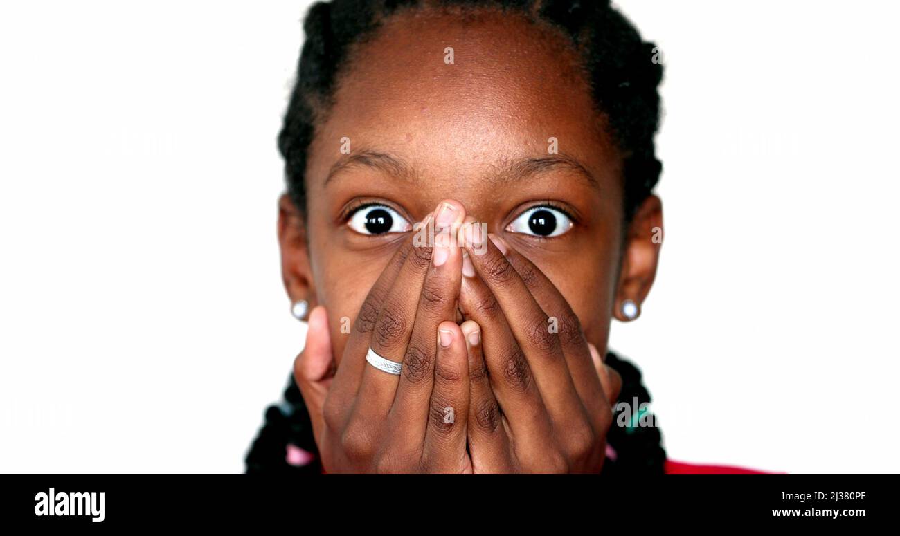 African girl surprise reaction, black teen young woman close-up face ...
