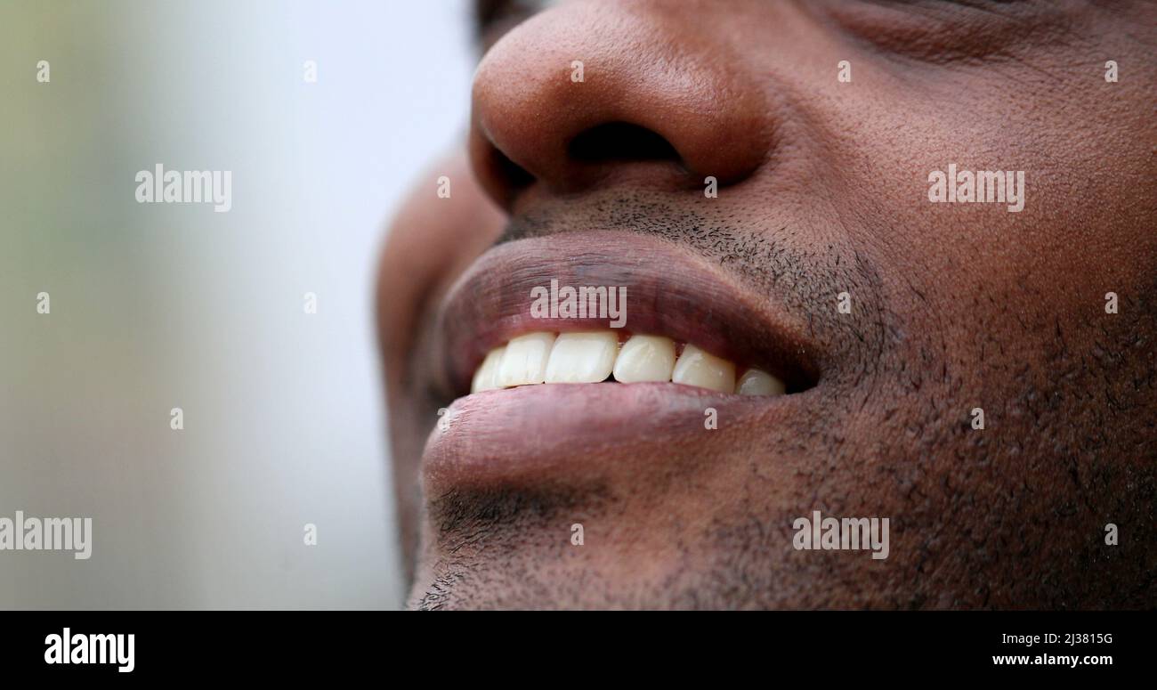 African man opening eyes close-up, black ethnicity person eye open ...