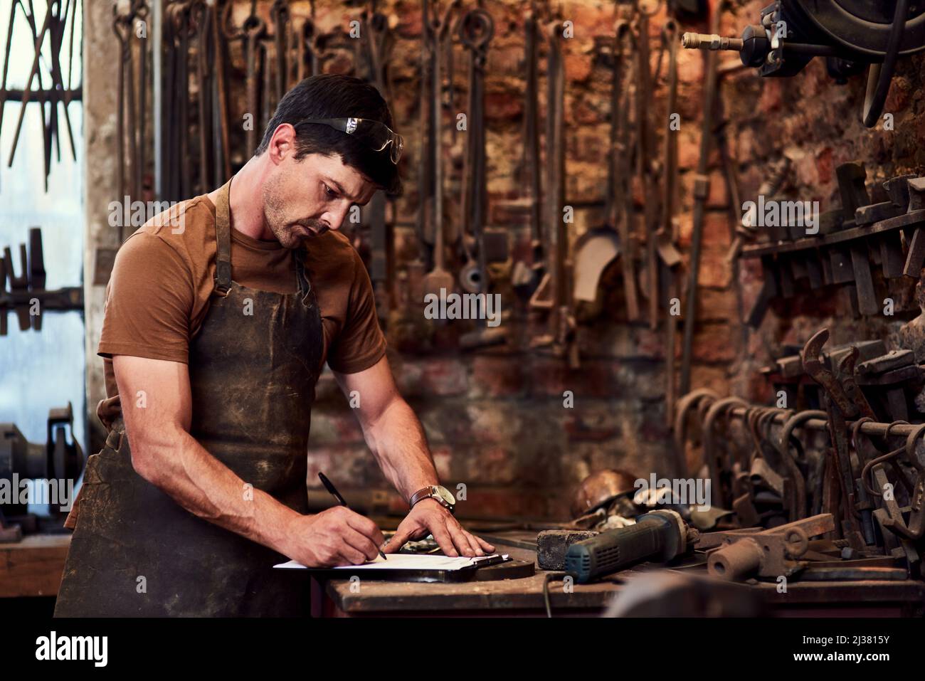 Always remember to go through your paperwork. Cropped shot of a ...