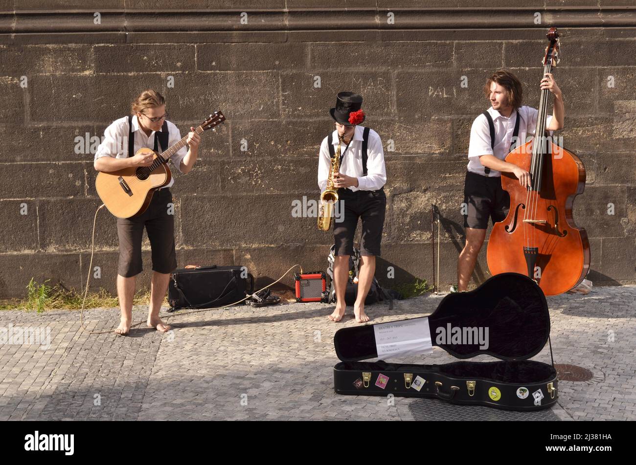 Street musicians playing the instruments in Old Town of Prague Czech ...
