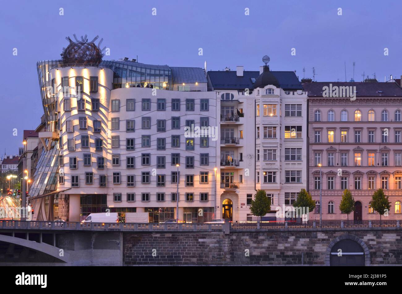Dancing House - modern landmark architecture at dusk, located on the ...