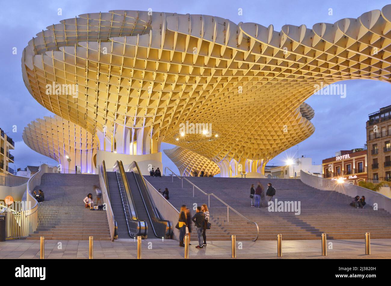 Metropol Parasol wooden structure illuminated at dusk, located at Plaza ...