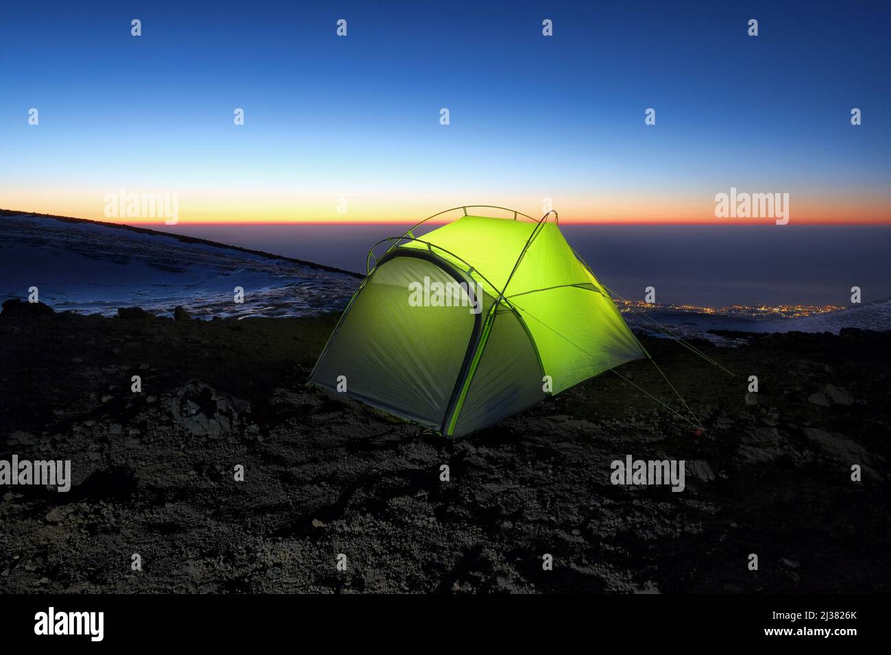 Illuminated green tent night hi-res stock photography and images - Alamy