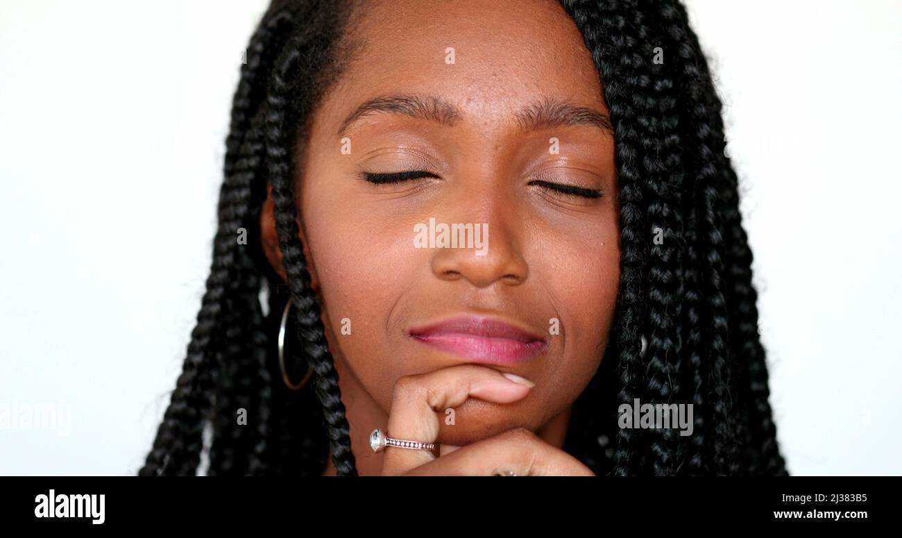 Pensive black African girl thinking, portrait teen daydreaming ...