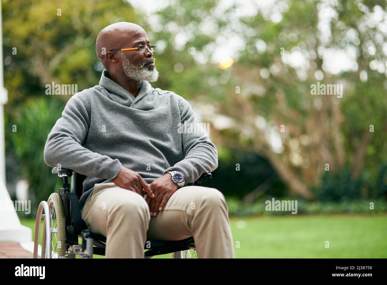 Old black man in wheelchair hi-res stock photography and images - Alamy