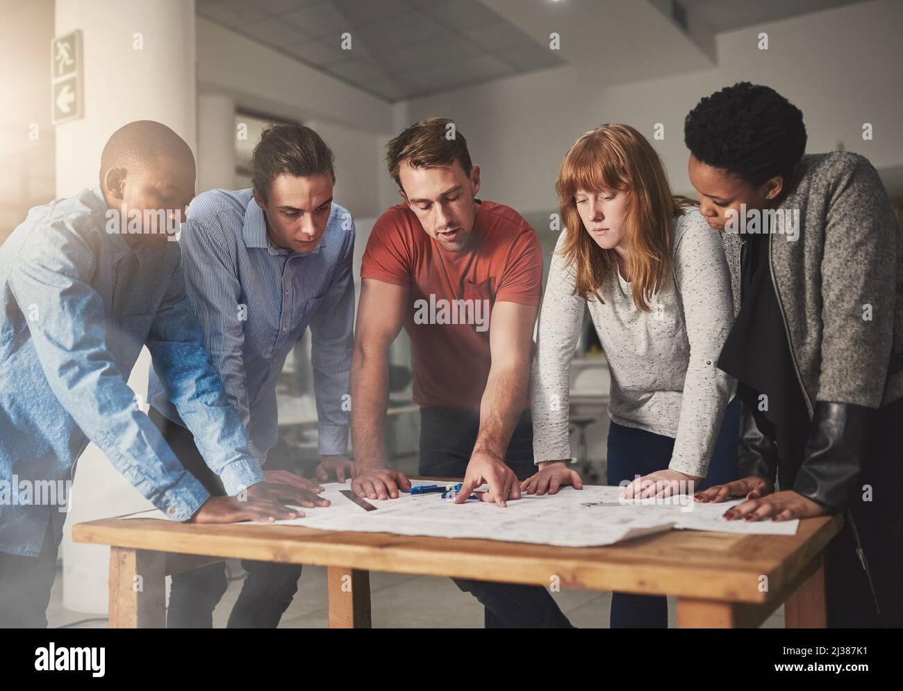 Collaboration is key. Cropped shot of architects working together on a ...