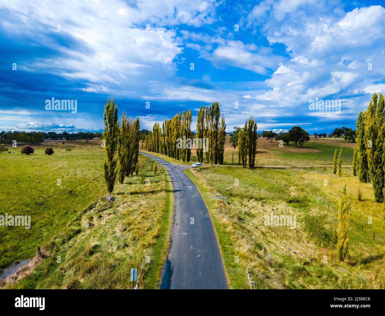 An aerial view of an asphalt road in a rural area in Wellington Vale ...