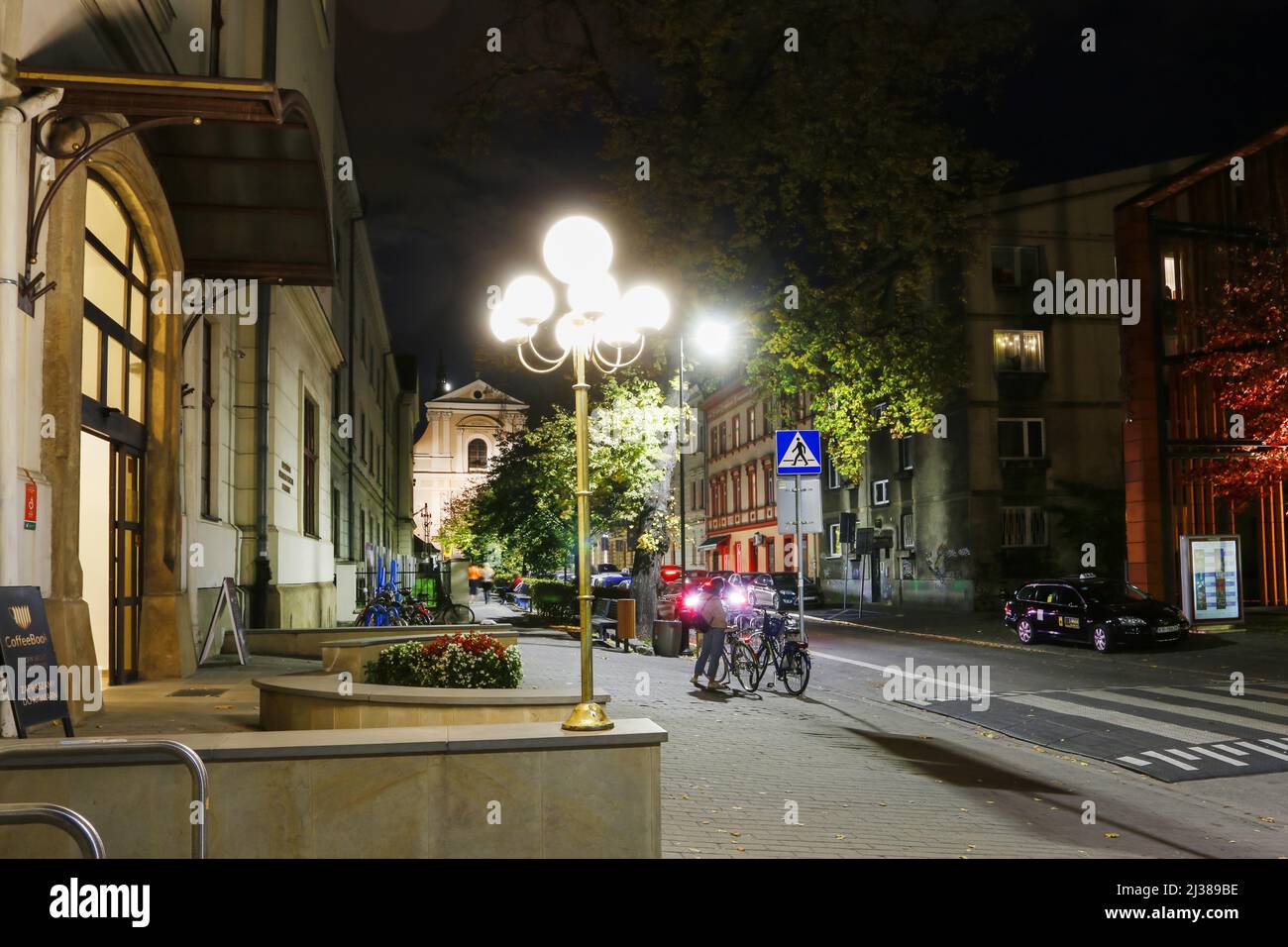 Pubs, clubs and restaurants on Dolnych Mlynow street in Krakow, Poland ...