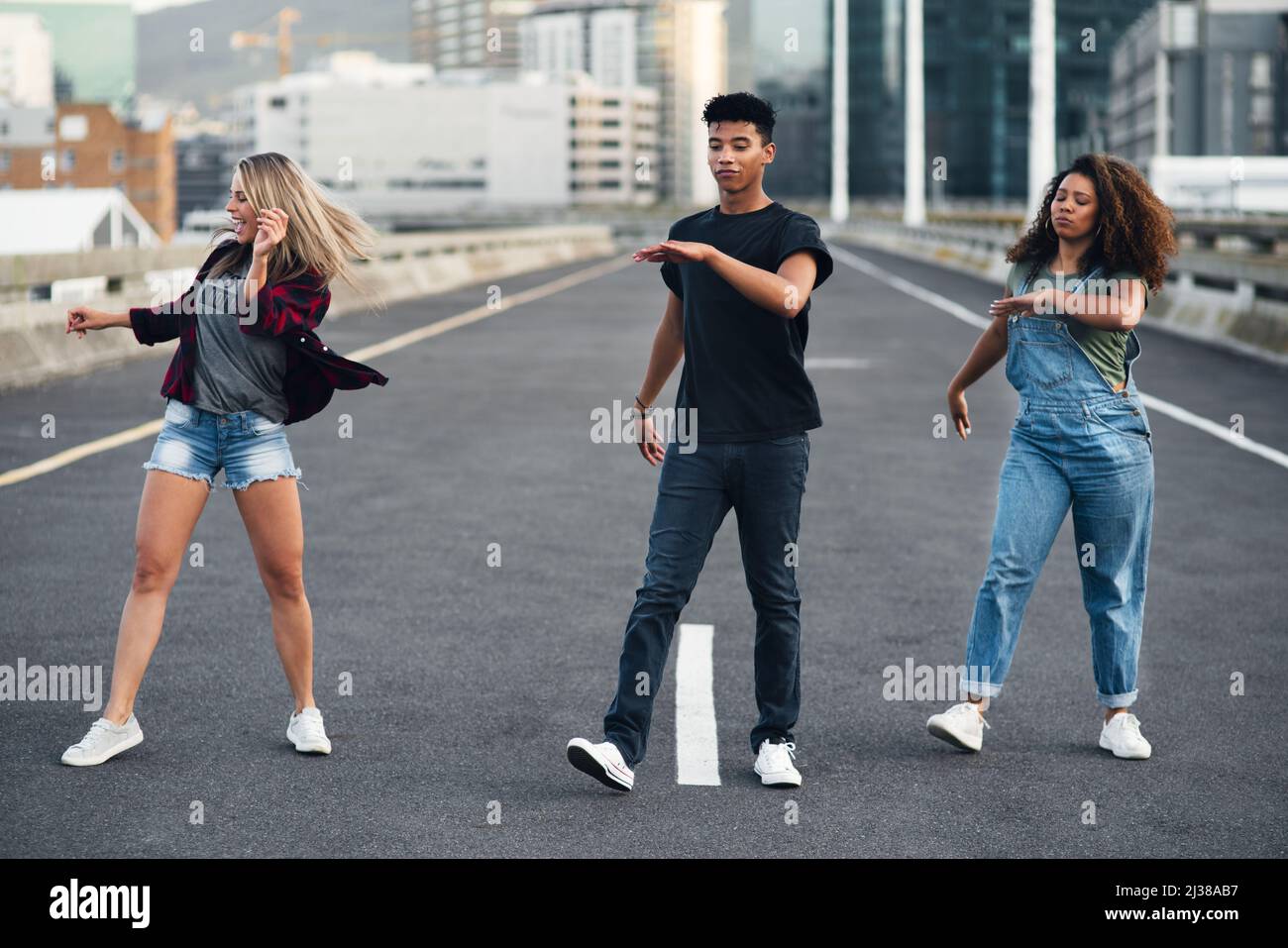 Theyre making moves in the city. Full length shot of a group of dancers ...