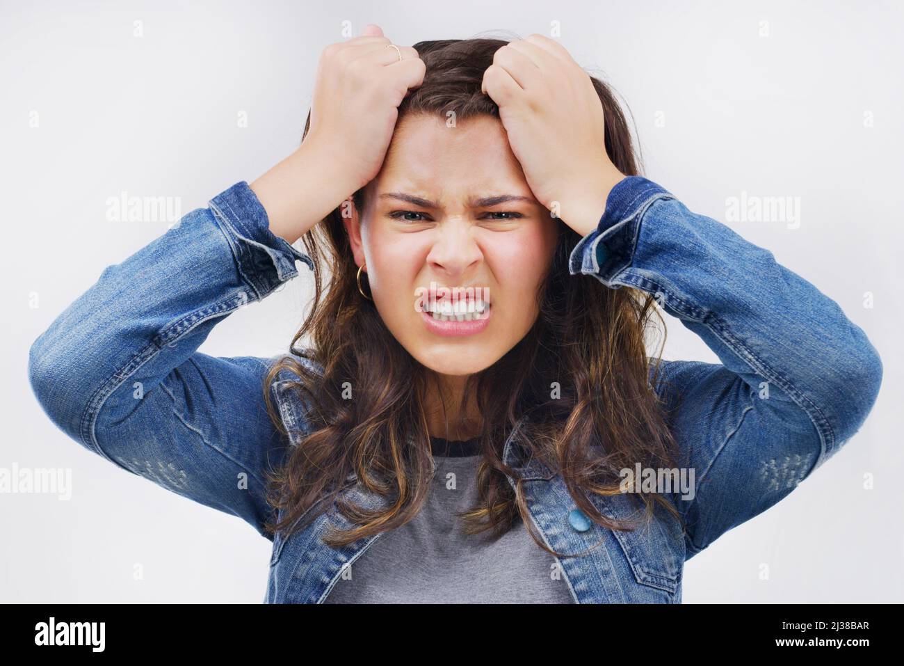 This stress is killing me. Studio portrait of an attractive young woman ...