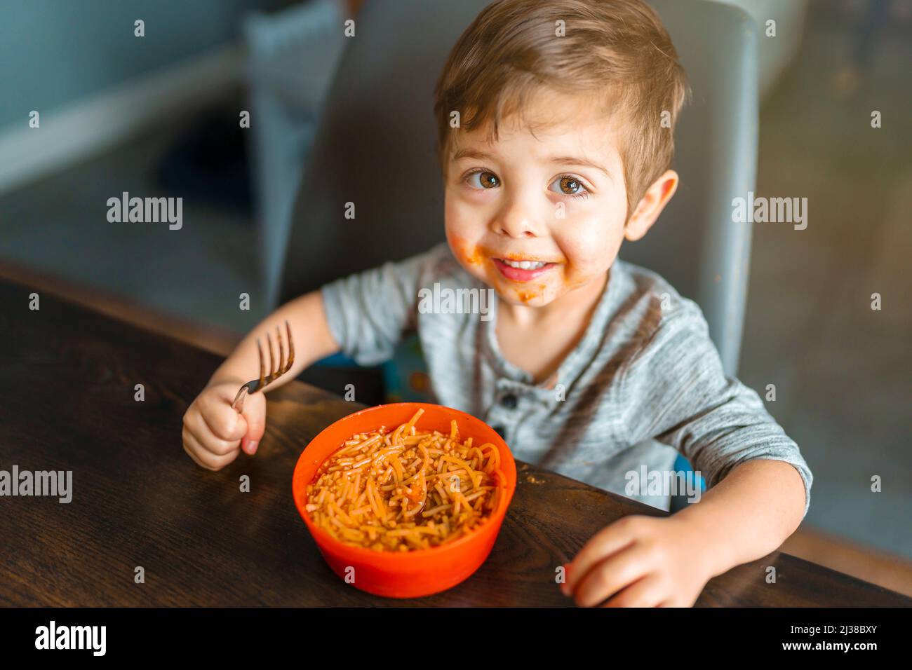 Eating spaghetti funny hi-res stock photography and images - Alamy