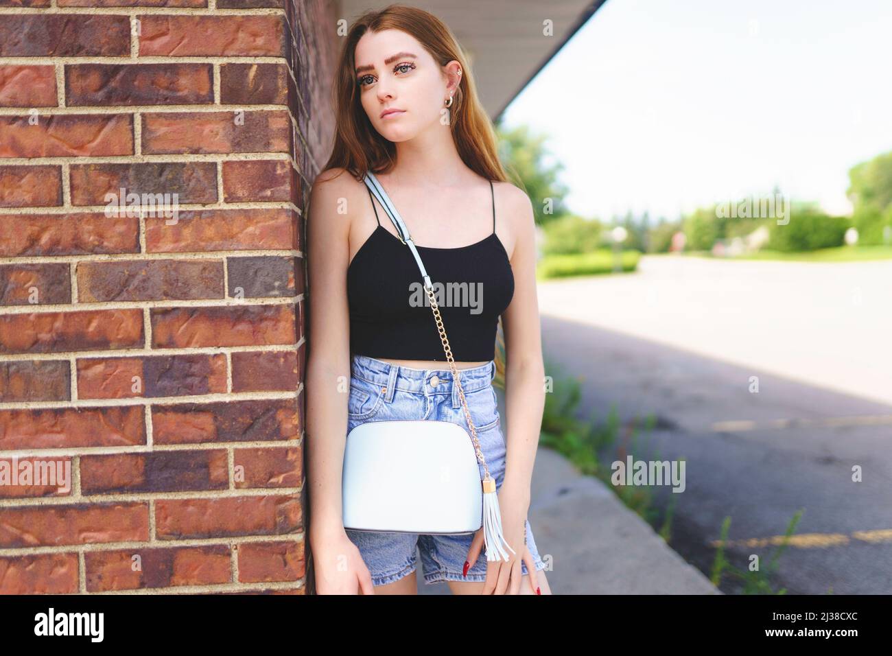 Nice and cool teen girl standing portrait Stock Photo - Alamy