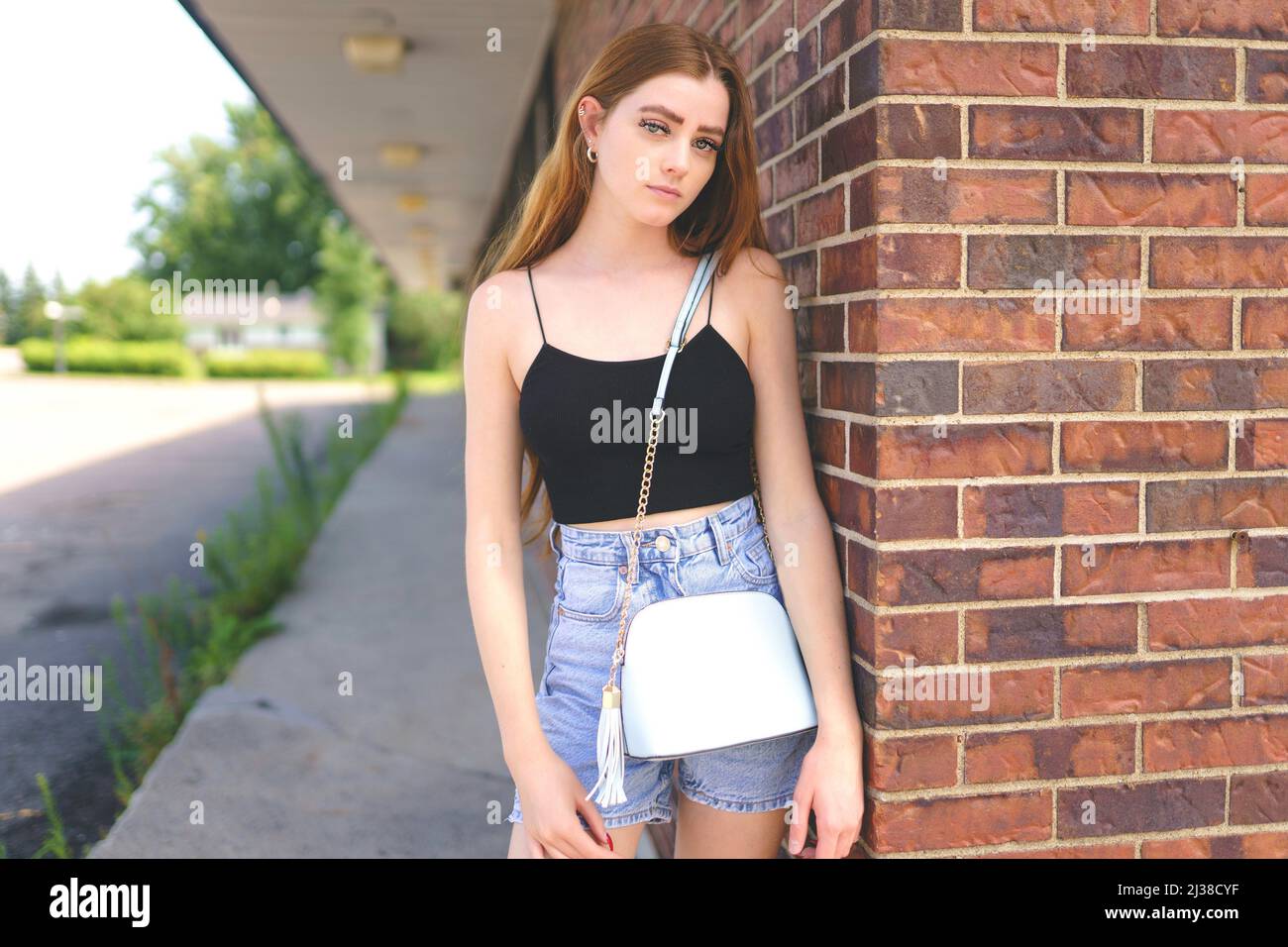 Nice and cool teen girl standing portrait Stock Photo - Alamy
